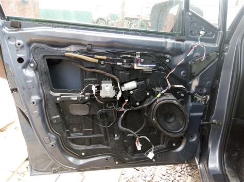 Как снять обшивку двери мазда 3