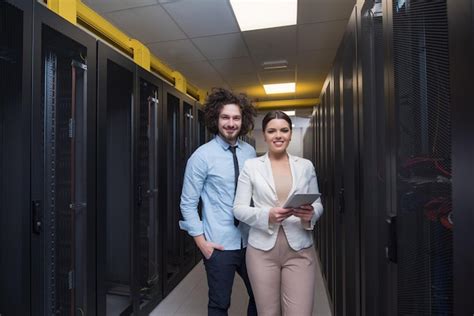 Premium Photo Young It Engineer Showing Working Data Center Server