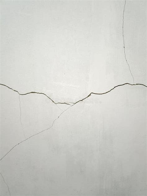 Cracked Plaster Damaged Plastered Concrete Wall In Chips Cracks