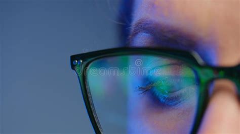 Woman In Glasses Looking On The Monitor And Working With Data And