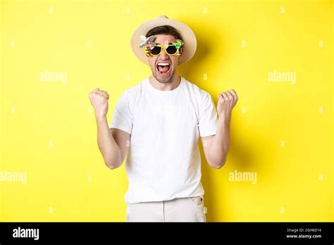 Happy Guy Going On Vacation Winning Or Celebrating Wearing Summer Hat And Sunglasses Tourist