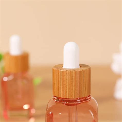Vanjoin 화장품 유리 포장 30ml 스퀘어 멋진 에센셜 오일 중지지 유리 대나무 캡 Dropper 핑크 유리 오일 세럼 병