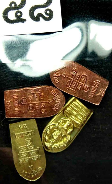 ปรกใบมะขาม หลวงพ่อทองดำ วัดเขาพูลทอง จ จันทบุรี รุ่น 1 ปี 37เนื้อทองเหลือง ทองแดง เนื้อละ 2 องค์