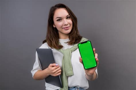 Premium Photo Portrait Of A Student With A Laptop And A Mobile Phone