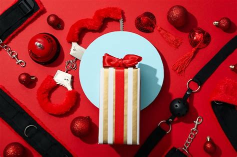 Premium Photo Sex Toy With New Year S Decor On A Red Background
