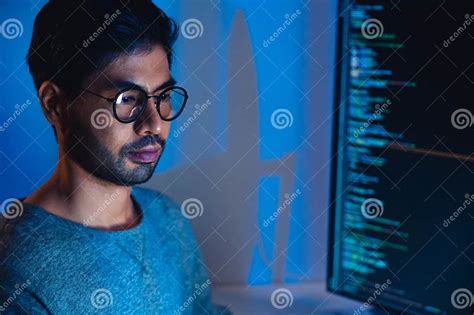 Indian Software Development Working On Coding Computer Screen And Flowchart At Night In Modern