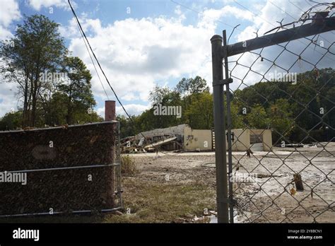 Debris Clings To Structures Marking The Height Of Intense Flooding
