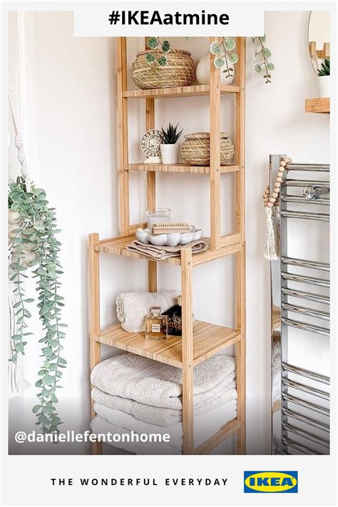 A Shelf With Towels And Baskets On It