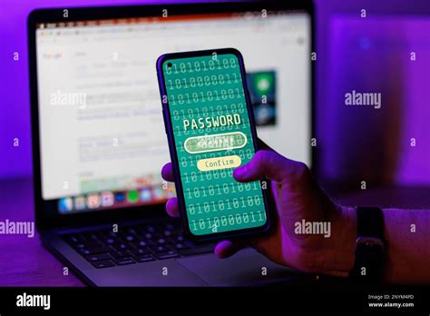 Person Typing Password On Smartphone In Laptop Background Digital Cybersecurity Concept High