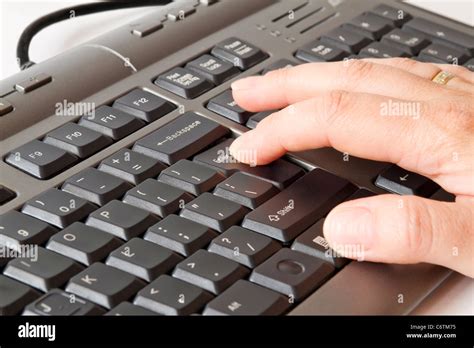 Hand Pressing Enter On Keyboard Stock Photo Alamy