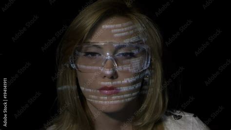 Close Up Of A Sexy Blonde Hacker Girl Reading Programming Code In