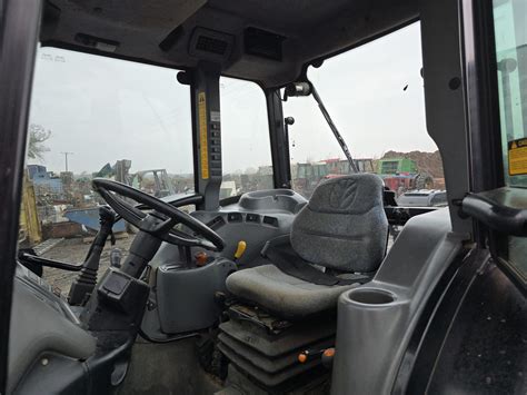 New Holland Tn75 4x4 Loader Tractor Manual Shuttle Joystick Controls New Holland Tn75 4x4 Loader Tractor Manual Shuttle Joystick Controls