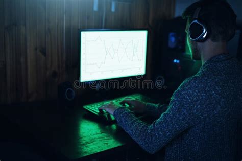 Just Breached Down A Firewall A Young Man Using A Computer And Hacking