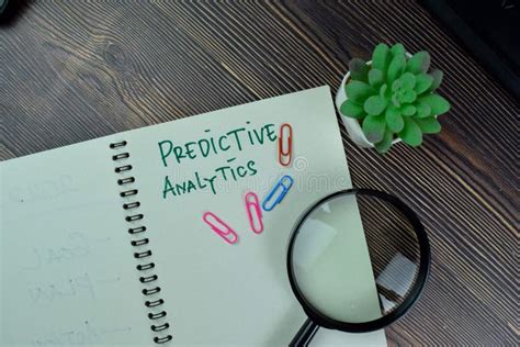 Predictive Analytics Write On A Book Isolated On Wooden Table Stock Image Image Of Note Book