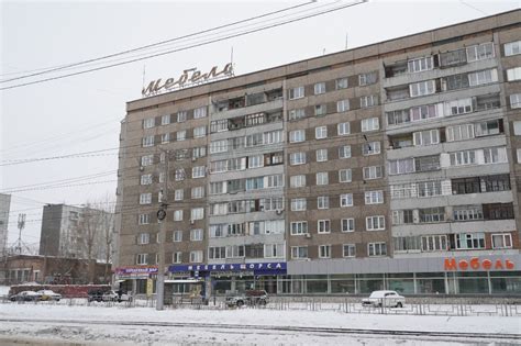 На ул. Щорса в Красноярске уберут ограждения и советскую вывеску