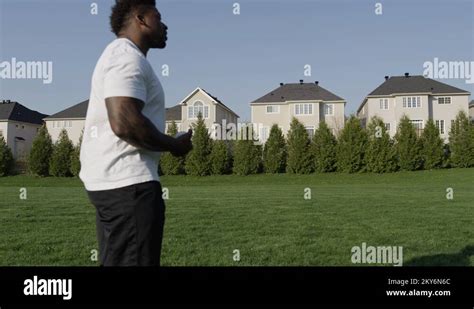 Dad Getting Ready To Play Catch With His Sons Stock Video Footage Alamy