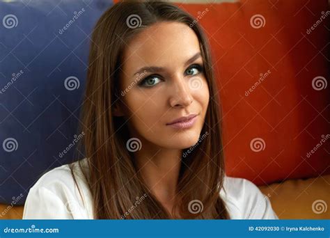 Portrait Of Beautiful Young Girl With Long Straight Dark Hair Evening