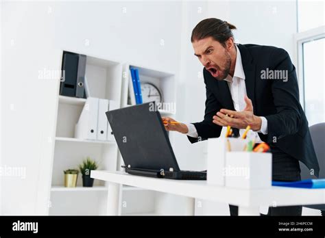 Man Workflow In The Office Documents Emotions Boss Stock Photo Alamy