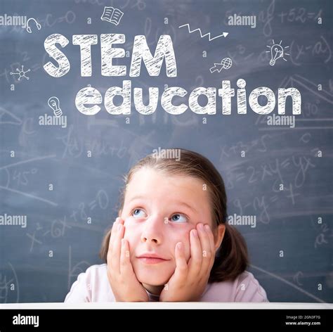 Science Technology Engineering Math Education Concept School Girl With Stem Text On Blackboard