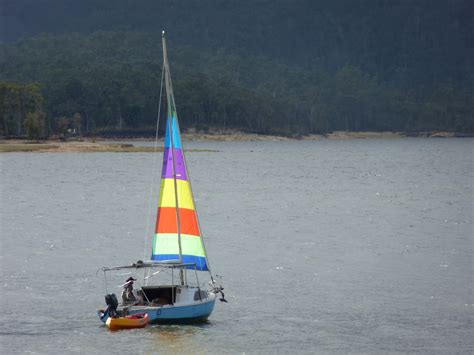 Free Image Of Small Sailboat Towing A Dinghy Freebiephotography