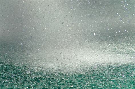 Close Up Of Water Splashing In Motion Capturing Dynamic Energy And Fluid Patterns Stock Image