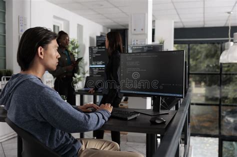 App Engineer Looking At Computer Typing Machine Learning Server Code