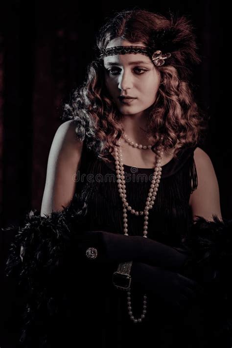Portrait Of Vintage Styled Red Haired Woman Dressed In Great Gatsby Era