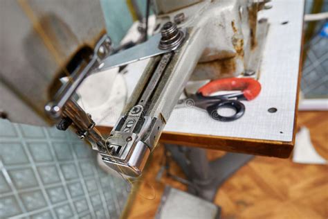 Crafting Textiles With Precision In A Vintage Sewing Studio Filled With