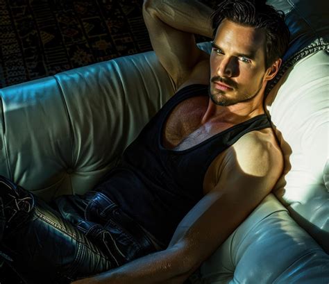 Model Relaxing On A White Leather Couch In Dim Light Premium AI Generated Image