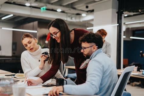 Diverse Professionals Strategizing For Business Expansion Through Data Analysis And Market