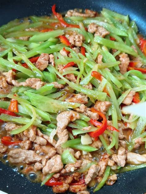 Stir Fried Celtuce With Pork Wosun Chao Rou Savory China