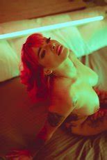 Redhead Chick With Tattoos Puts Her Naked Body On Display Photos