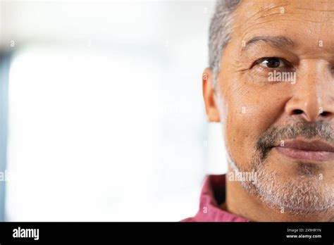 At Home Biracial Senior Male With Short Gray Hair And Beard Looking At Camera Copy Space