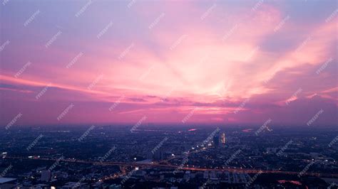 Violet Color Of Sunset Beautiful Sky With Cityscape Background