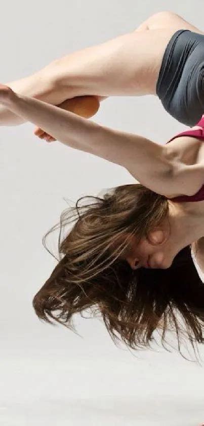 Dynamic Gymnast Pose Wallpaper Free Download
