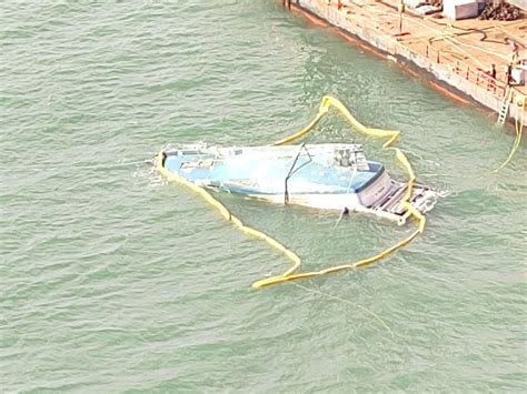 Capsized Squid Boat North Of Ventura Harbor Awaiting Barge Based