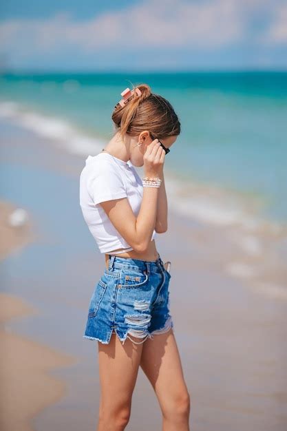 Adorable Teen Girl On The Beach Enjoy Her Summer Vacation Premium Photo