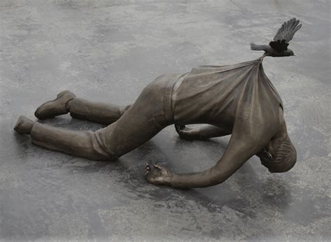 Bird Dragging Man Statue At Jeremiah Jobe Blog