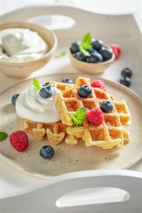 Homemade And Delicious Waffles With With Raspberries And Blueberries
