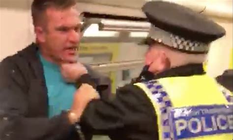 Watch A Policeman Attack And Arrest A Man For Not Wearing A Mask On A Train