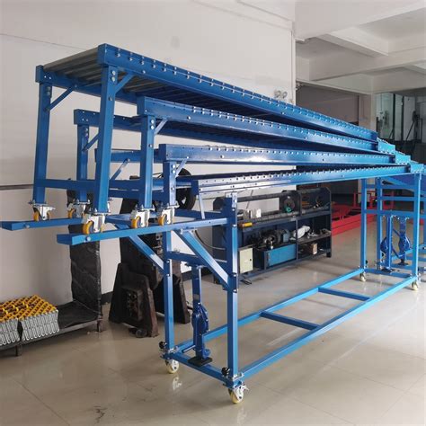 Telescopic Gravity Unloading Roller Conveyor System Loading Conveyor And Unloading Conveyor