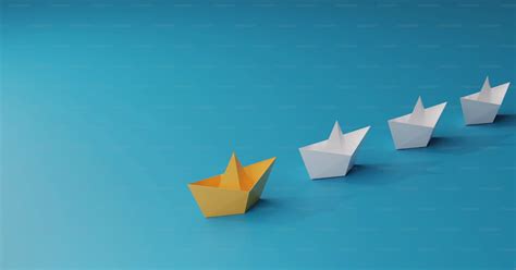 노란 종이 배를 든 지도자는 파란 배경에 하얀 배를 이끌고 있다 비즈니스 리더십 3d 렌더링 그림입니다 사진 Unsplash의 종이접기 이미지