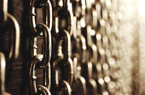 Premium Photo Close Up Of Metallic Chains On Wall