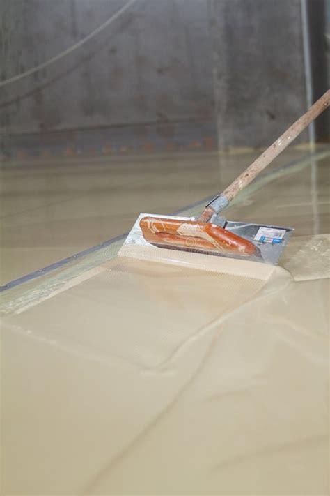 Epoxy Chemical Resin Is Being Applied With Great Intensity Using A