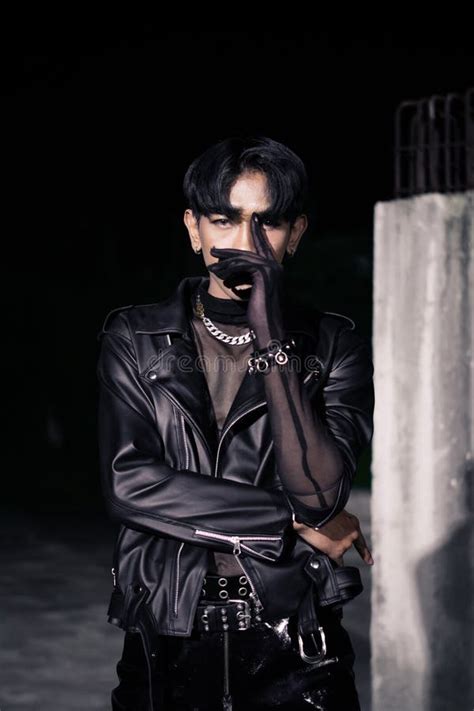 An Asian Man In A Black Leather Jacket Posing Like A Motorcycle Gang Stock Image Image Of