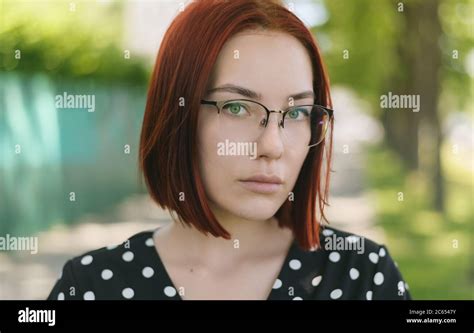 Portrait Of Beautiful Redhead Woman Wearing Glasses Stock Photo Alamy
