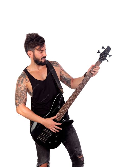 Premium Photo Attractive Guy In Black Playing Electric Bass
