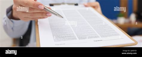 Businesswoman Propose To Sign Paper Point With Pen Where To Put Personal Signature Stock Photo