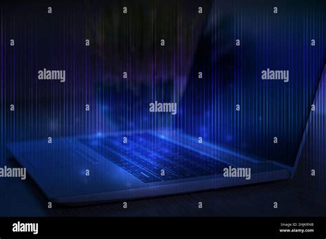 technological background laptop with stripes of light on blue learn programming language