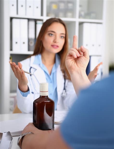 Premium Photo Alcoholic Hold In Arm Empty Bottle Showing Fuck